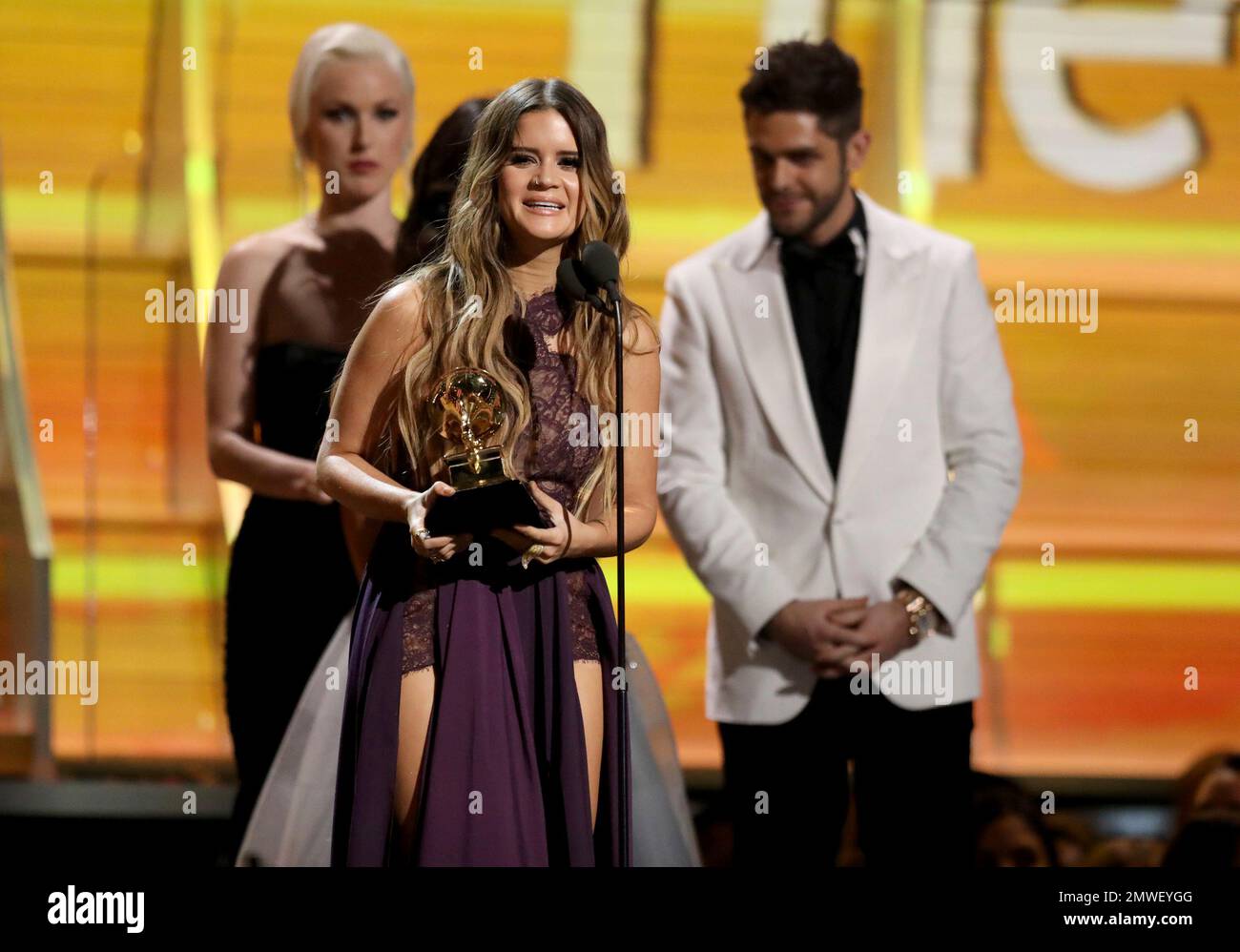 Maren Morris accepts the award for best country solo performance for ...