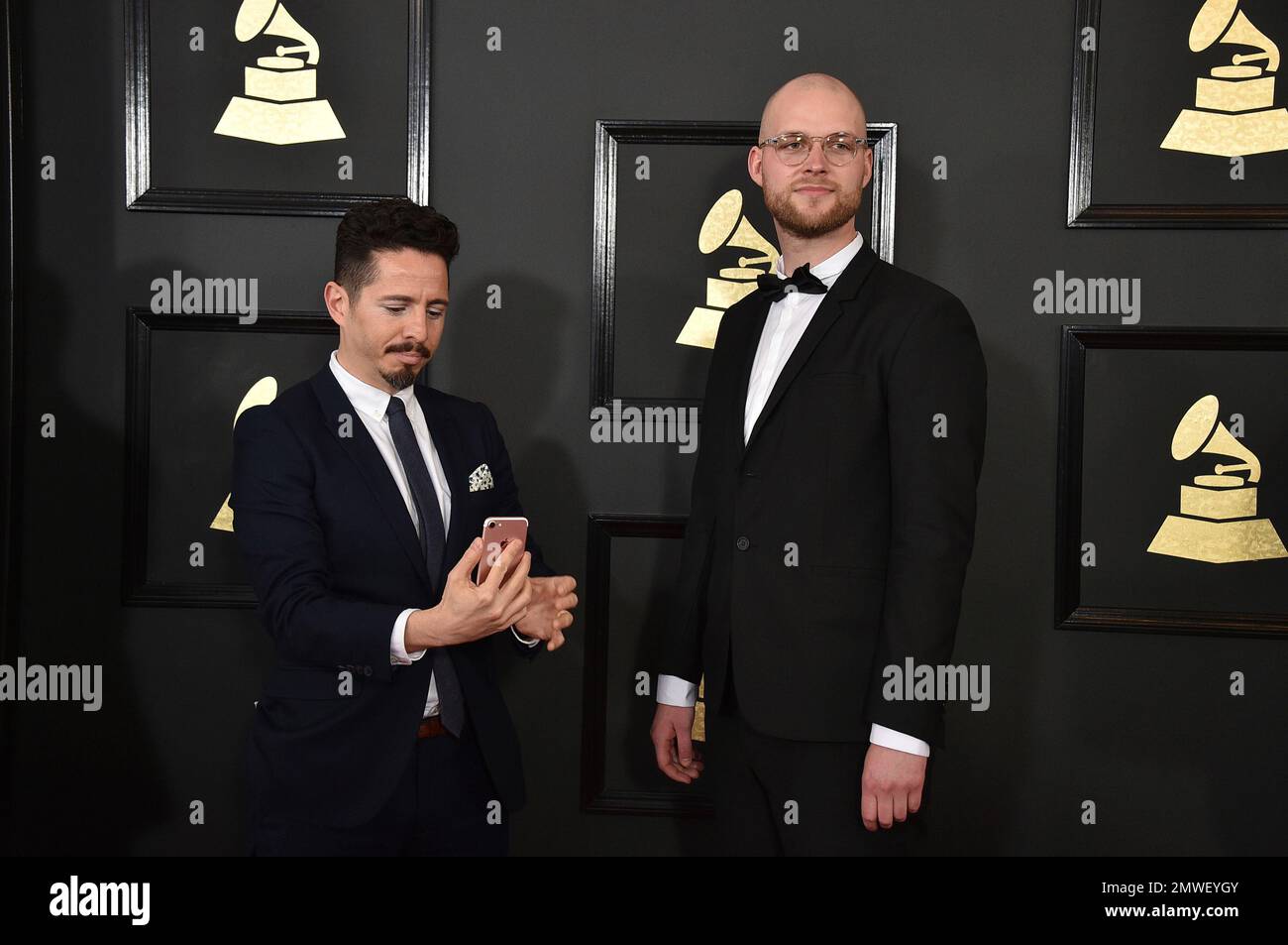 Jonathan Dagan, left, and Mathias Host arrive at the 59th annual Grammy ...