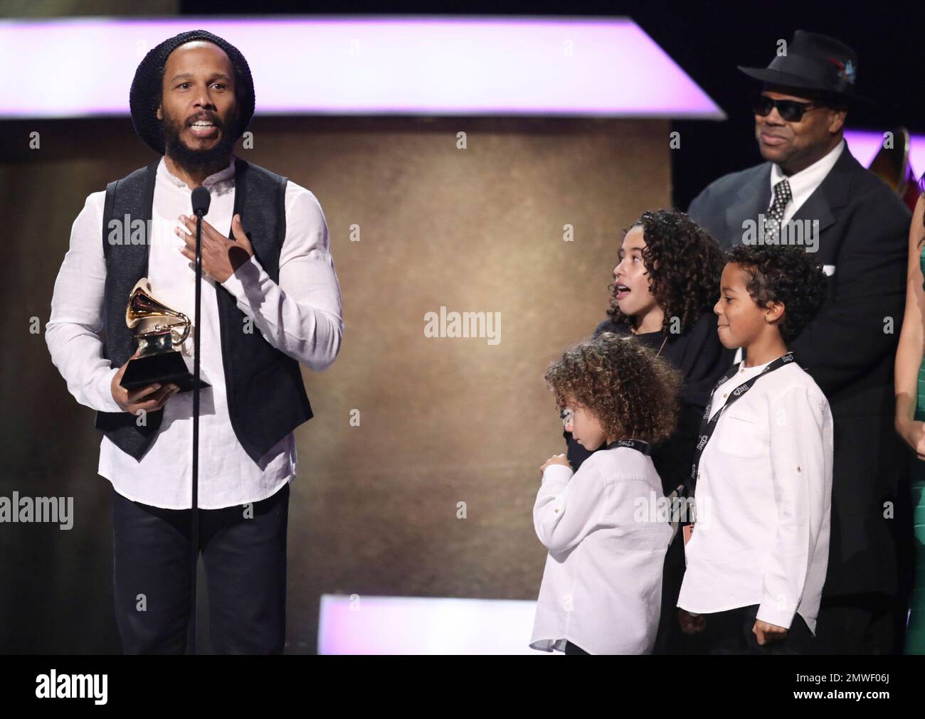 Ziggy Marley, left, accepts the award for best reggae album for "Ziggy ...