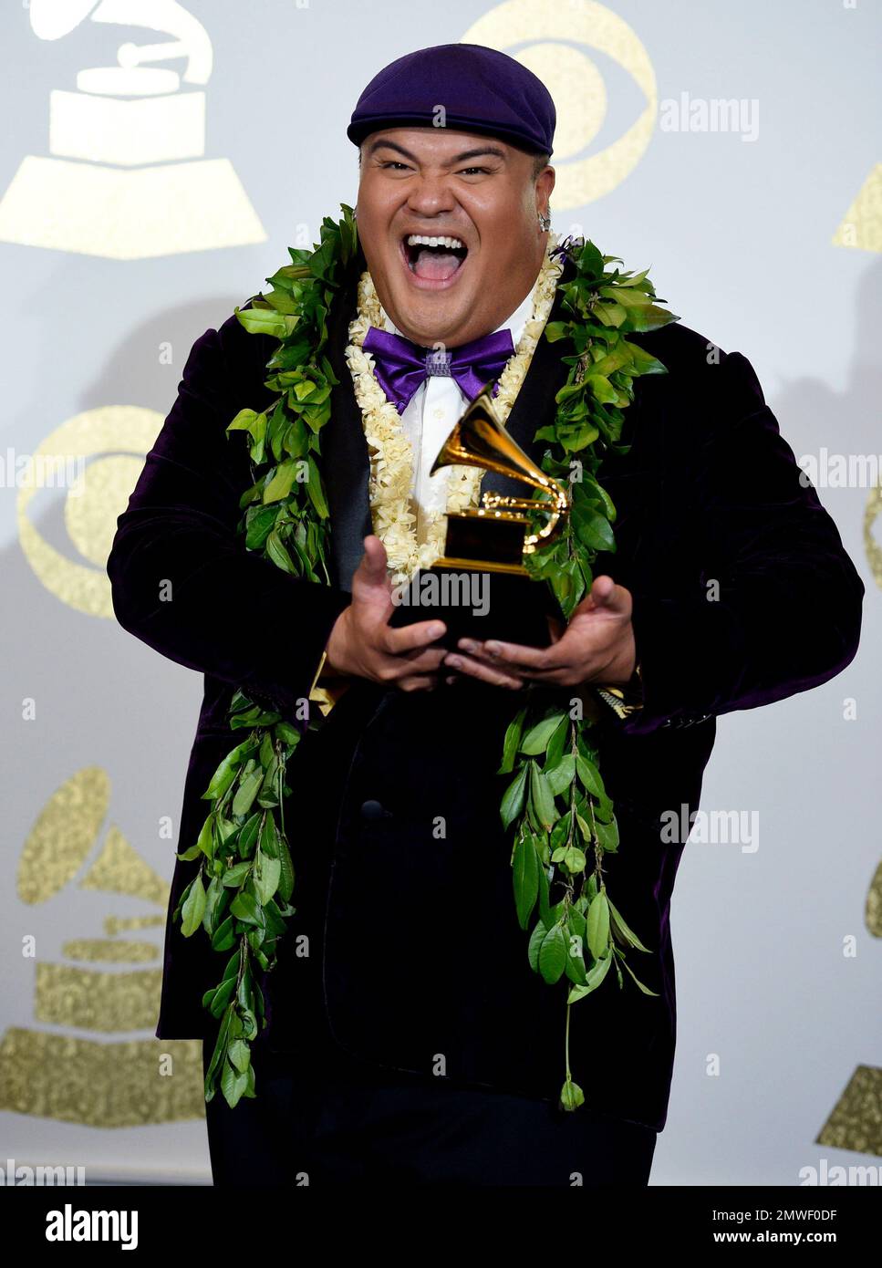 Kalani Pe'a poses in the press room with the award for best regional ...