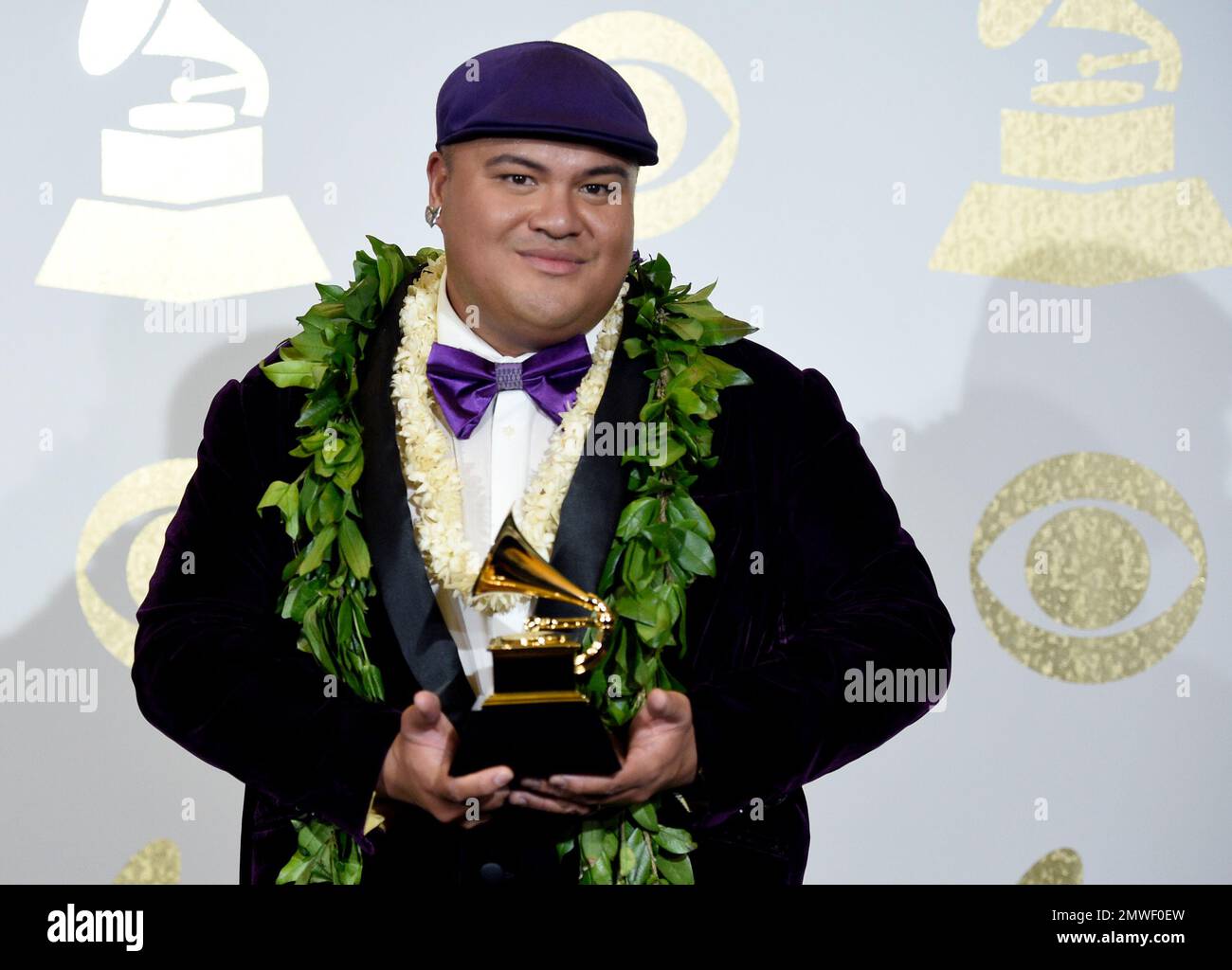 Kalani Pe'a poses in the press room with the award for best regional ...
