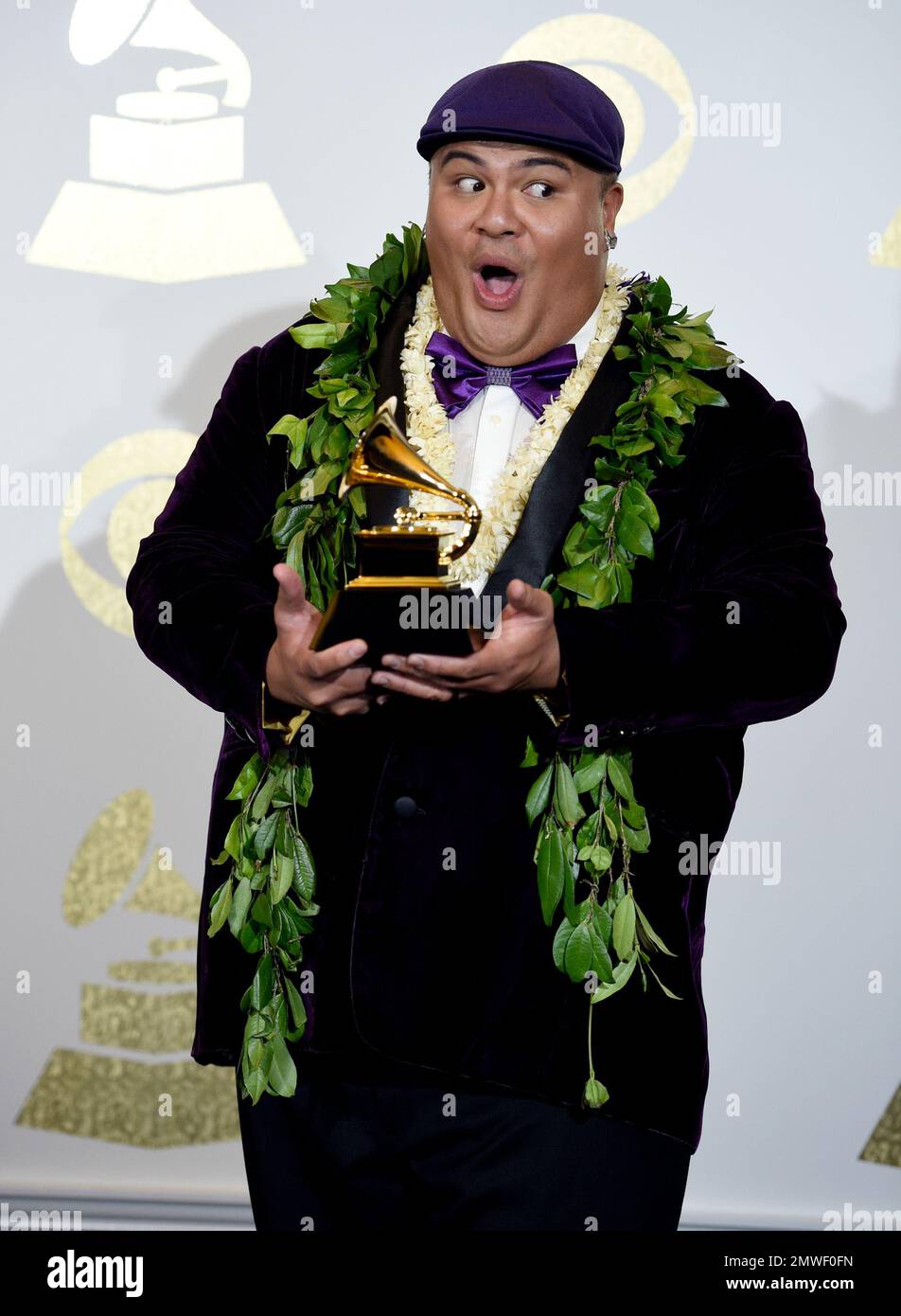 Kalani Pe'a poses in the press room with the award for best regional ...
