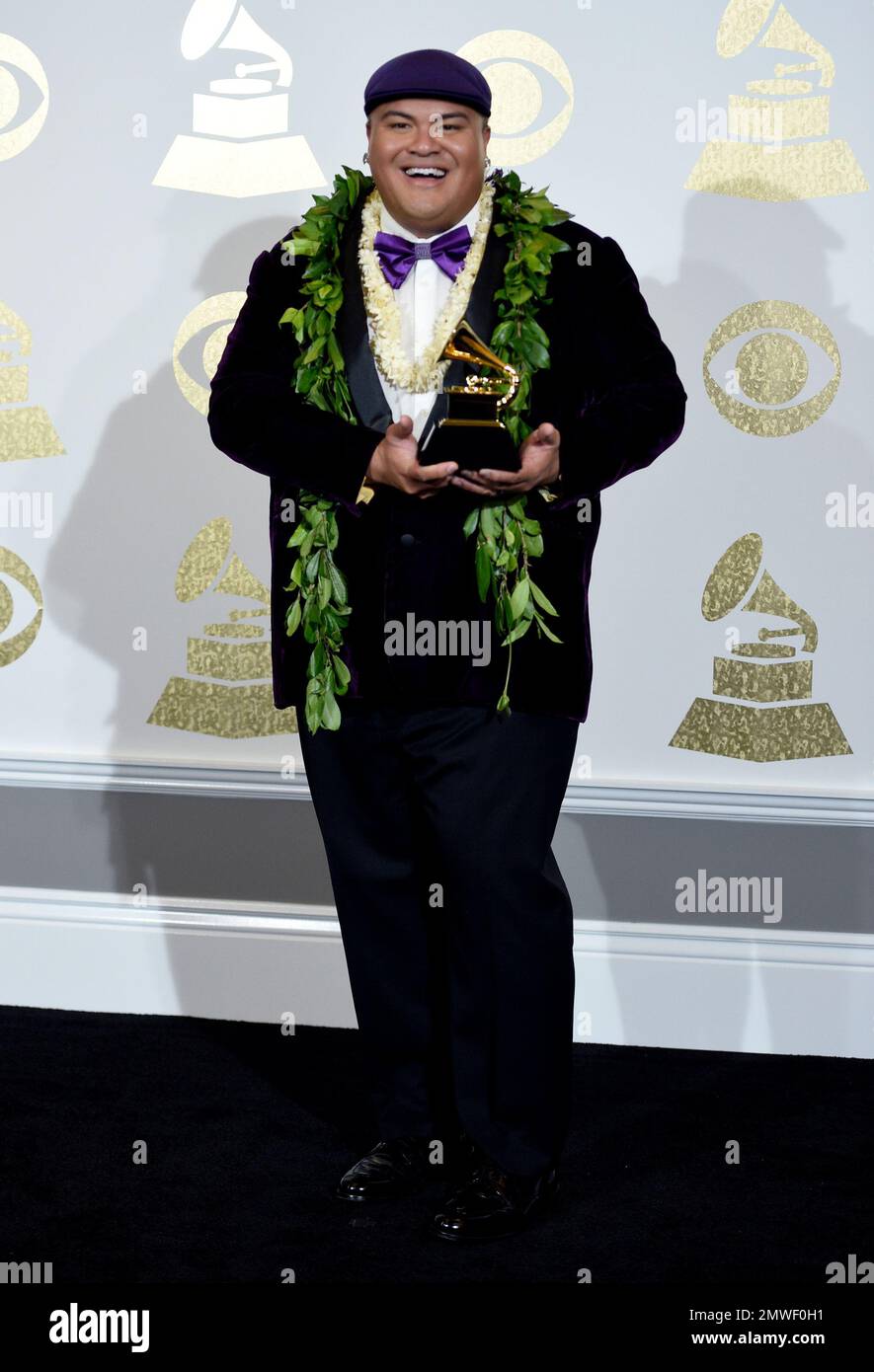 Kalani Pe'a poses in the press room with the award for best regional ...