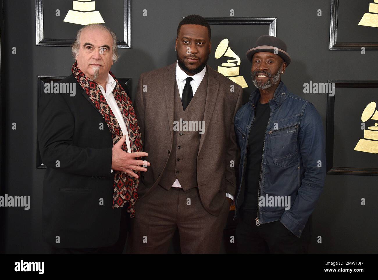 Steve Berkowitz, from left, Robert Glasper, and Don Cheadle arrive at ...