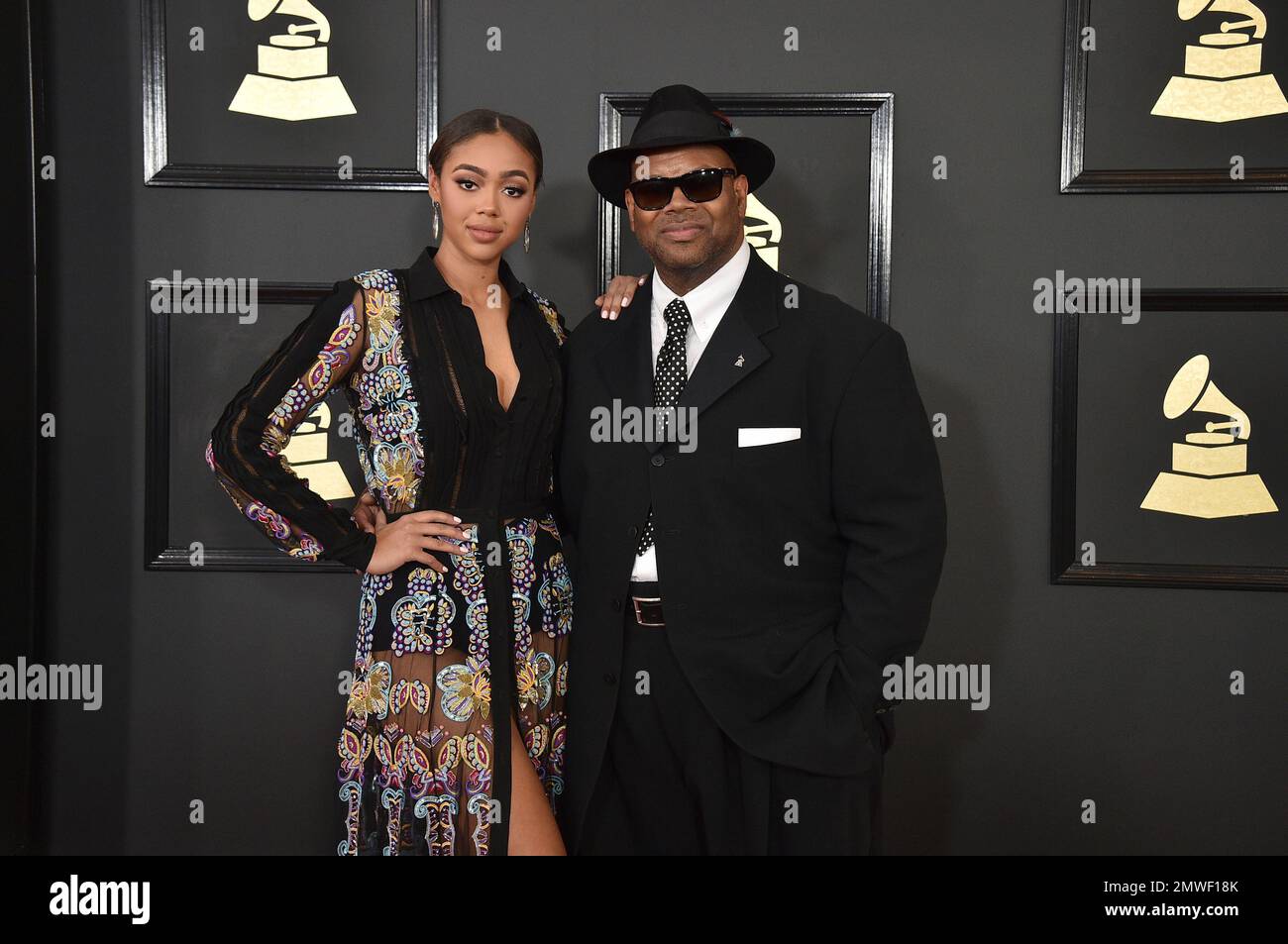 Bella Harris, left, and Jimmy Jam arrive at the 59th annual Grammy ...
