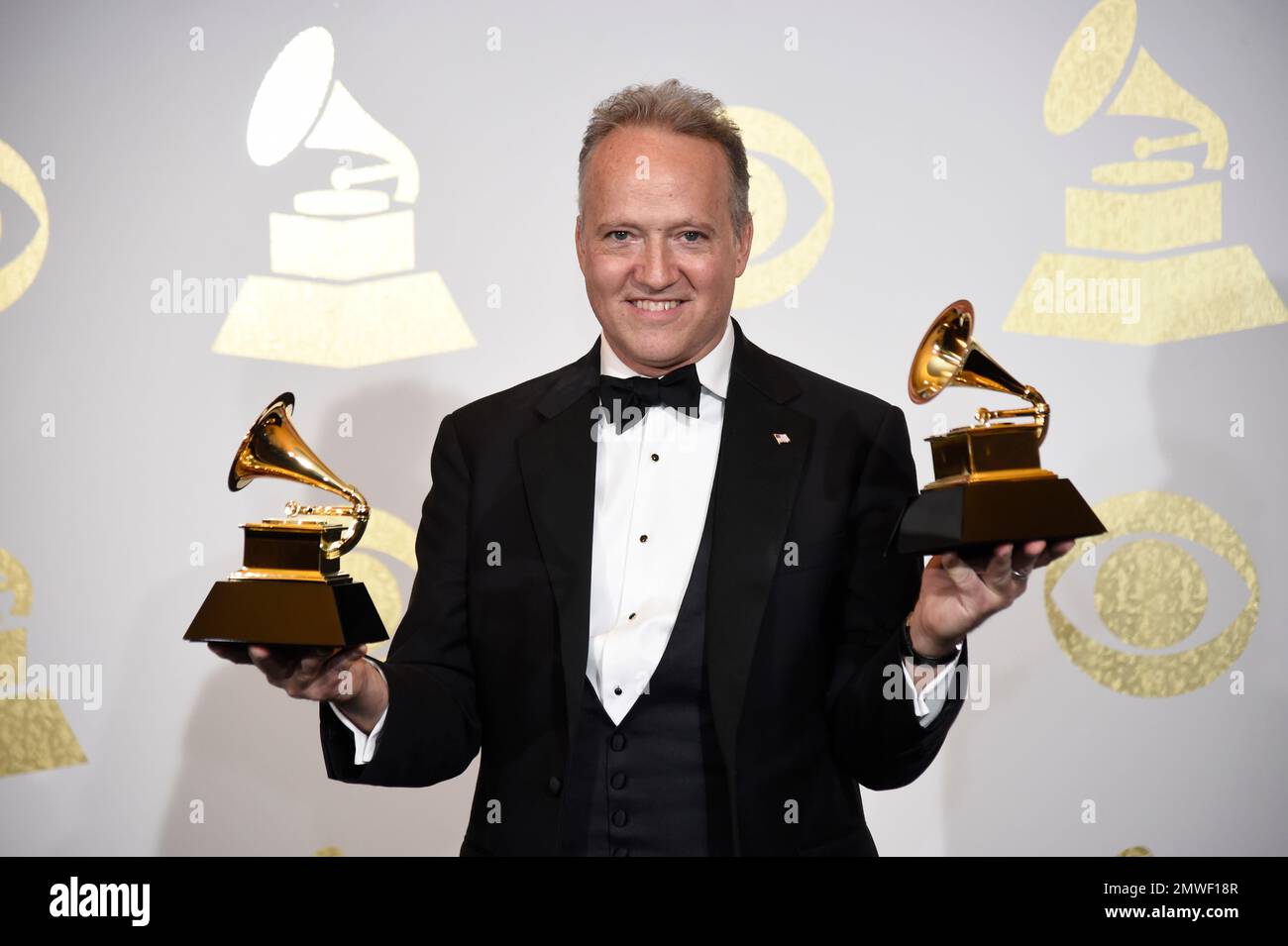 Ted Nash of the Ted Nash Big Band poses in the press room with the awards for best instrumental ...