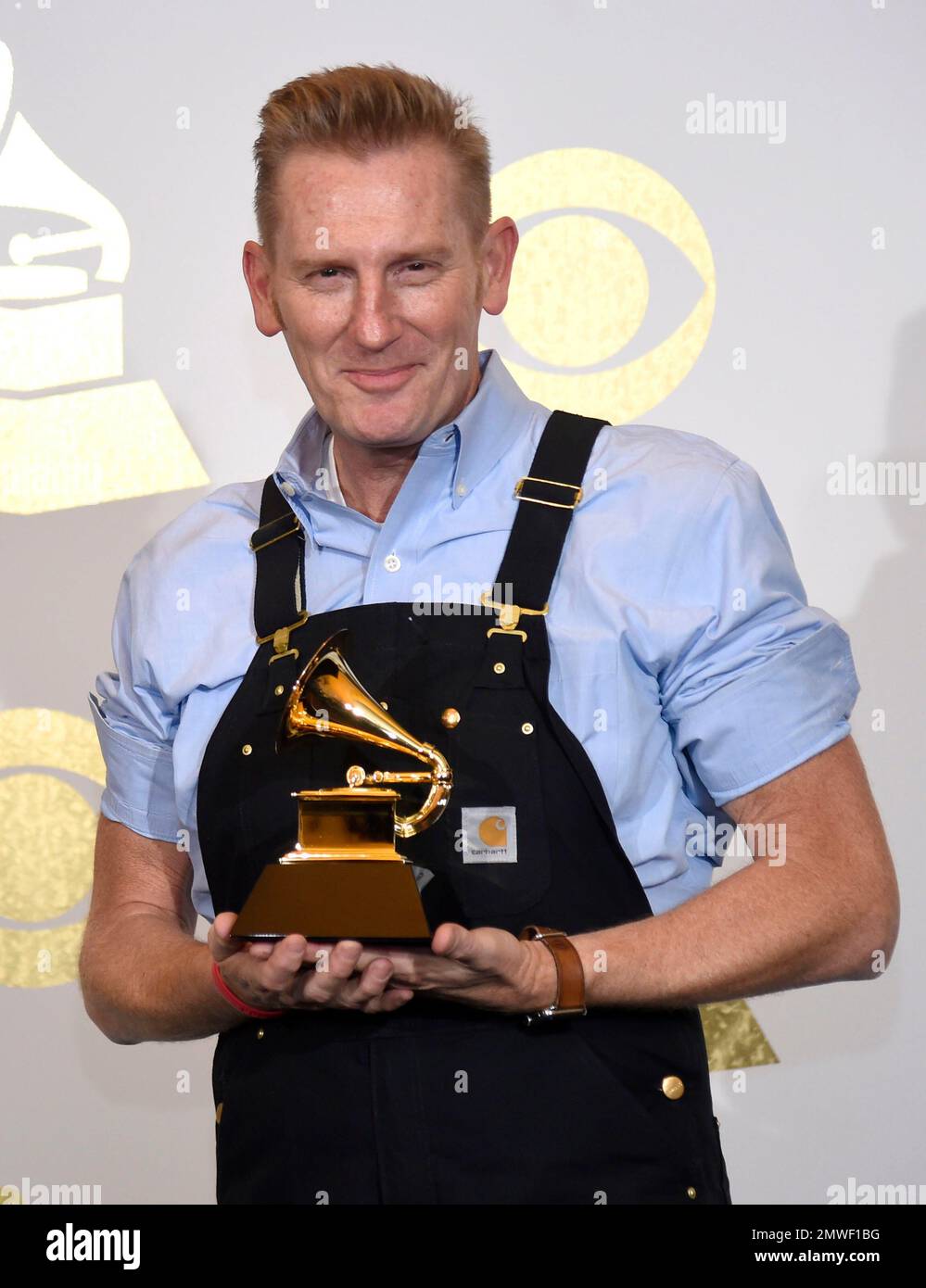 Rory Lee Feek, of Joey + Rory, poses in the press room with the award ...