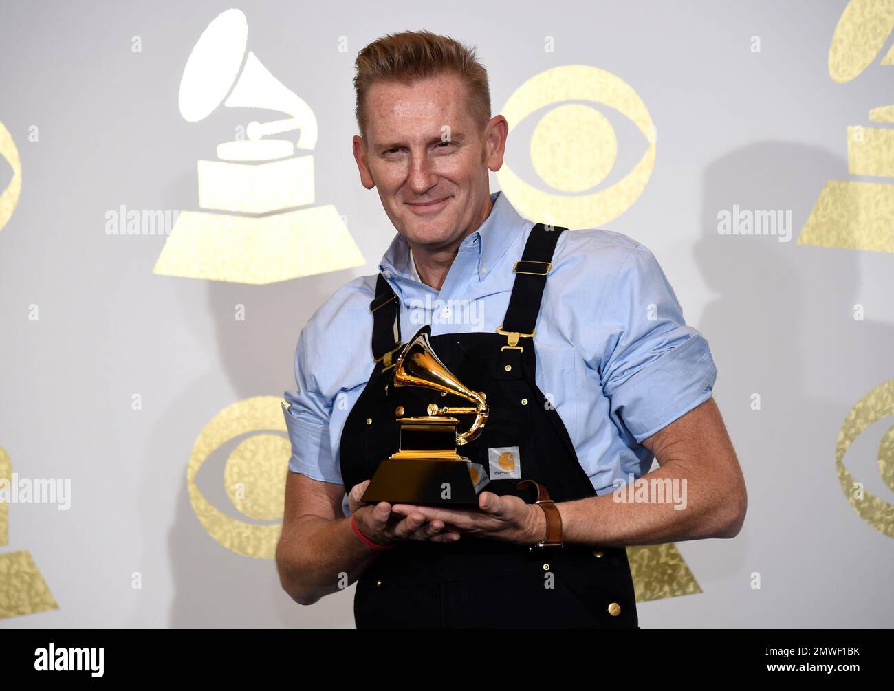 Rory Lee Feek, of Joey + Rory, poses in the press room with the award ...