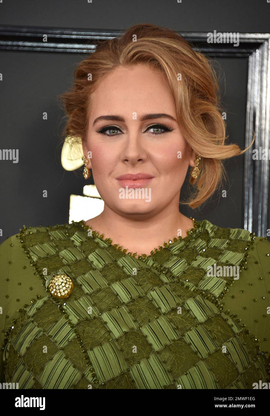 Adele arrives at the 59th annual Grammy Awards at the Staples Center on ...