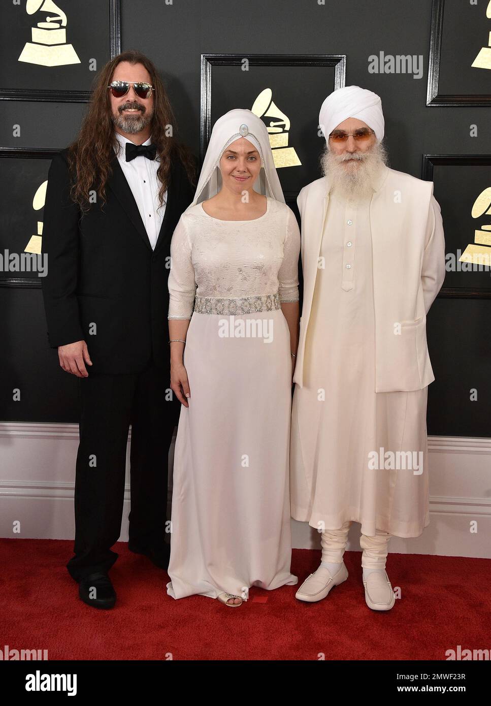 Adam Berry, from left, Gurujas, and Hari Jiwan Singh Khalsa of the ...