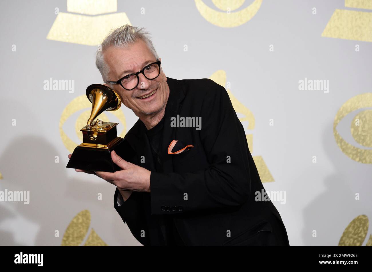 Gerard Lo Monaco poses in the press room with the award for best boxed ...