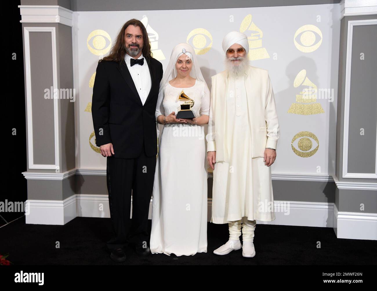 Adam Berry, from left, Gurujas, and Hari Jiwan Singh Khalsa of the ...