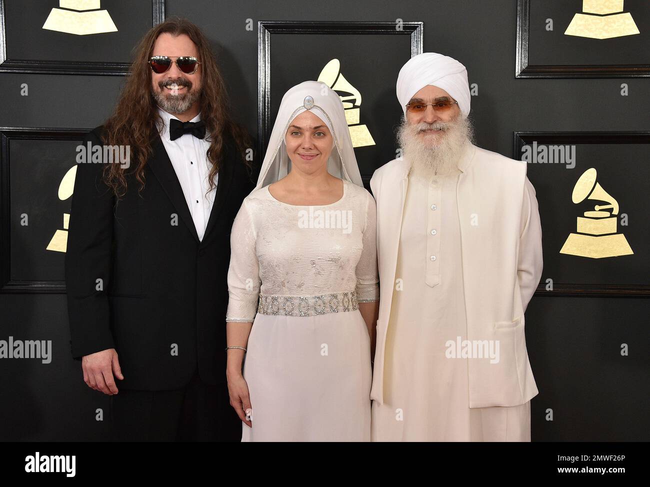 Adam Berry, from left, Gurujas, and Hari Jiwan Singh Khalsa of the ...