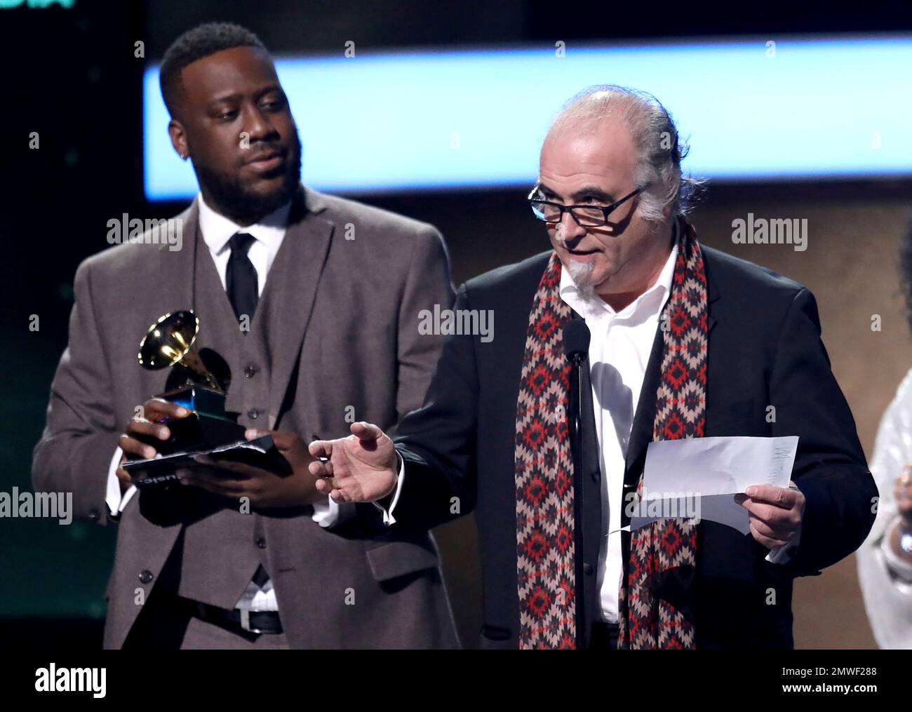 Robert Glasper, left, and Steve Berkowitz accept the best compilation ...