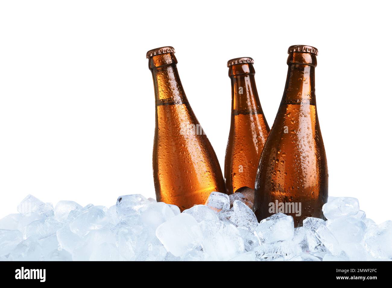 Ice cubes and bottles of beer on white background Stock Photo - Alamy