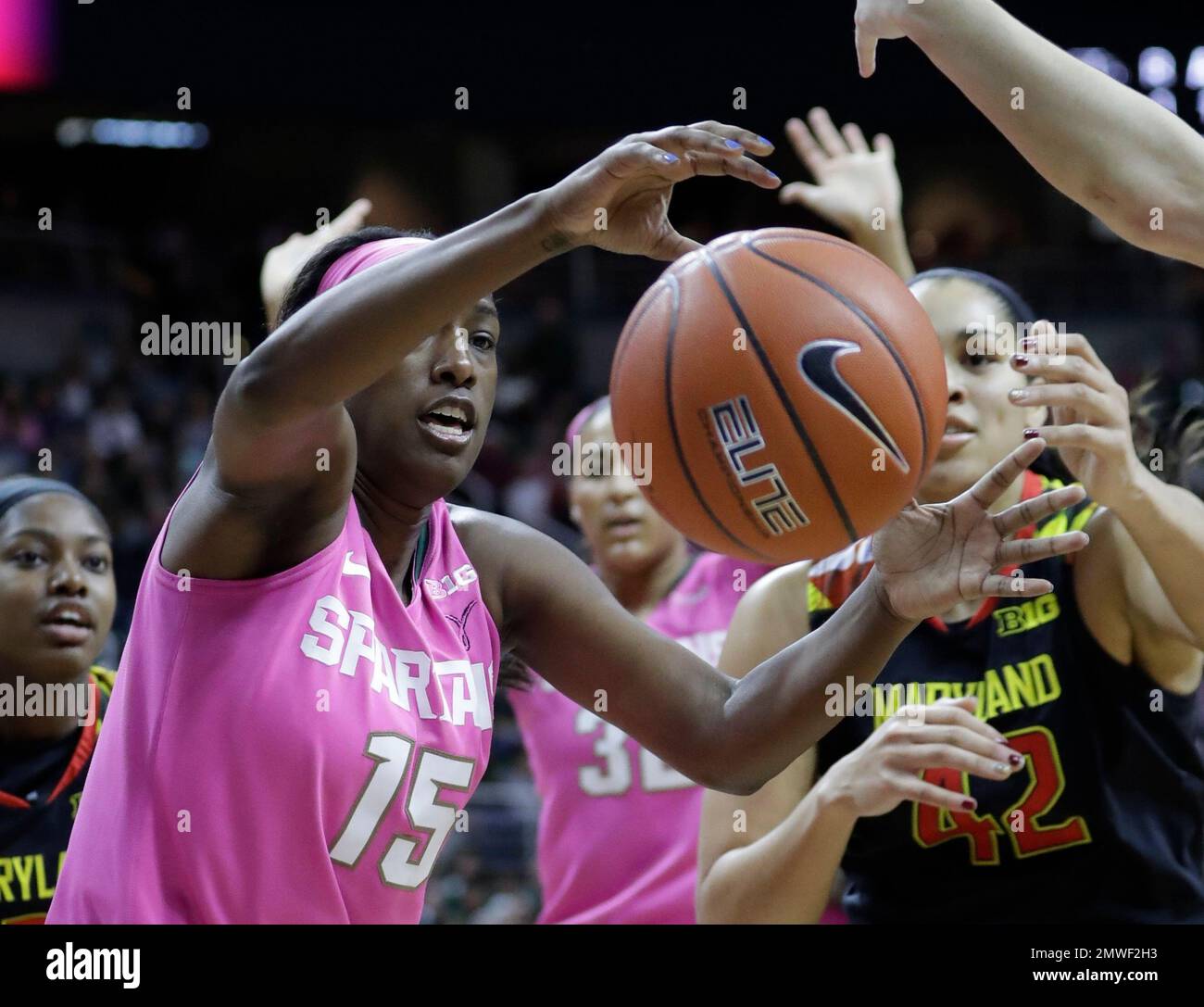 Michigan State forward Victoria Gaines (15) reaches for a rebound ...