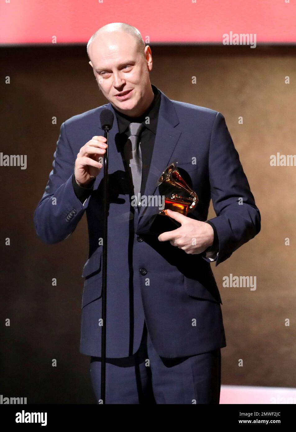 Jonathan Barnbrook accepts the award for best recording package for ...