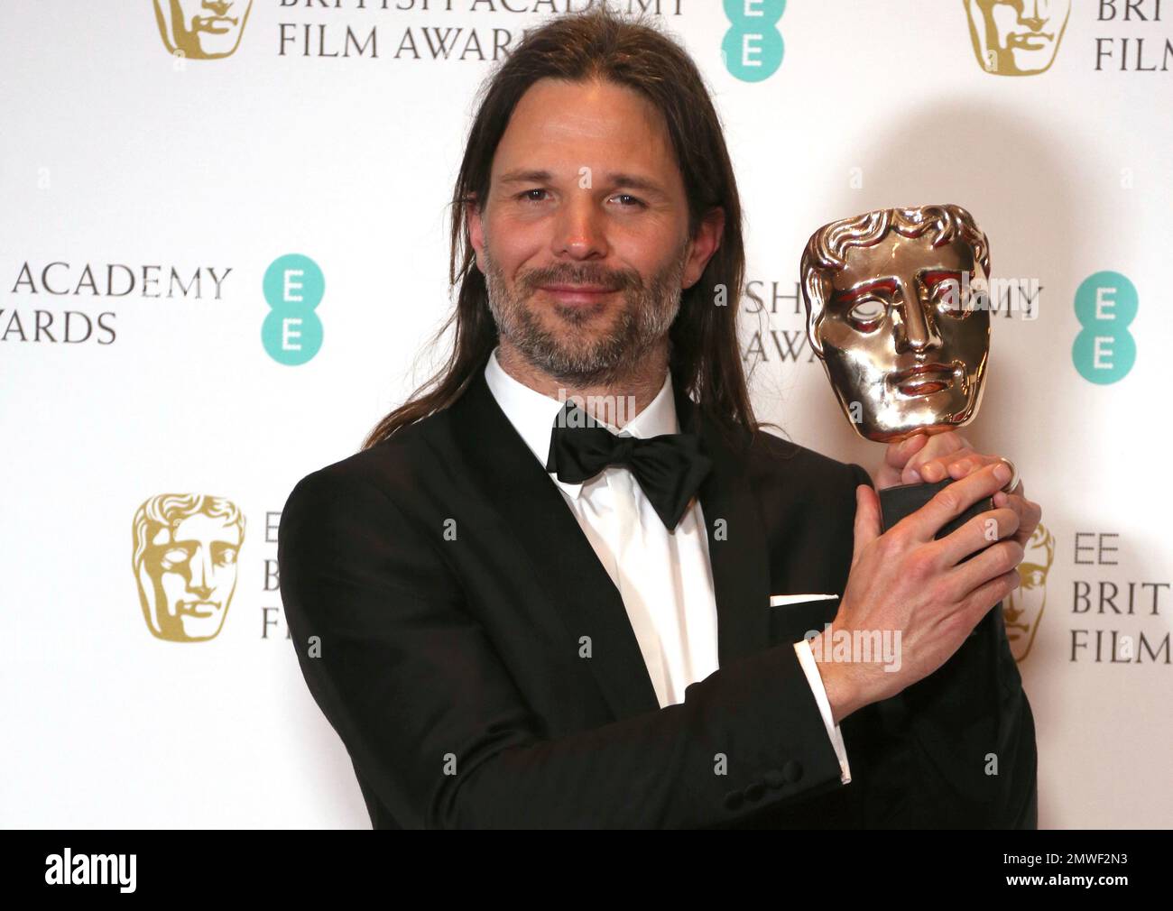 Cinematographer Linus Sandgren poses with his BAFTA award for Best ...