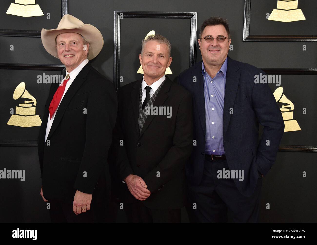 Ranger Doug Green, from left, Billy Thomas, and Vince Gill arrive at ...