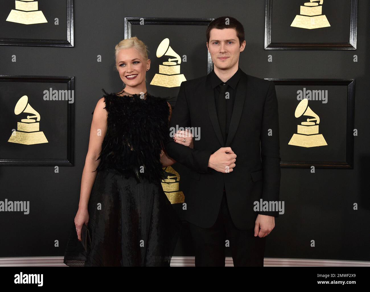 Liz Anjos, left, and Andre Anjos arrive at the 59th annual Grammy ...