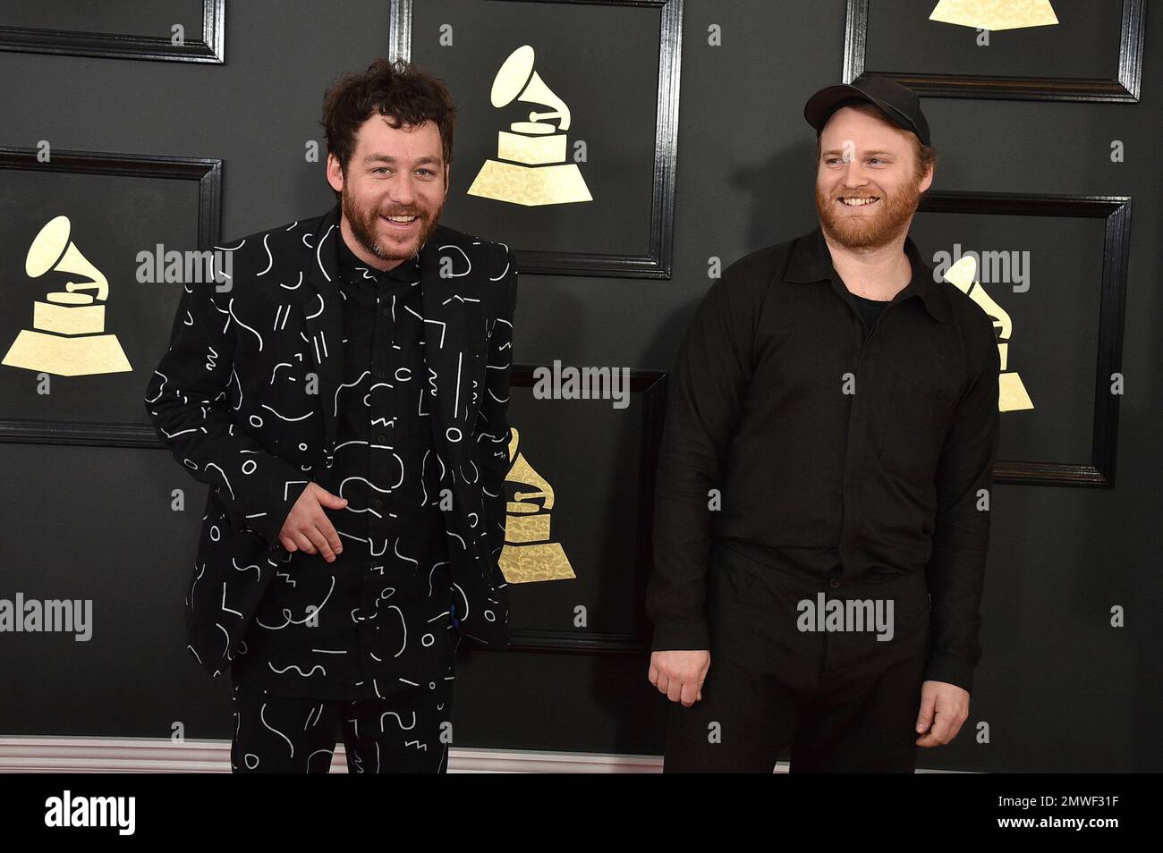 Kyle Dixon, left, and Michael Stein arrive at the 59th annual Grammy ...