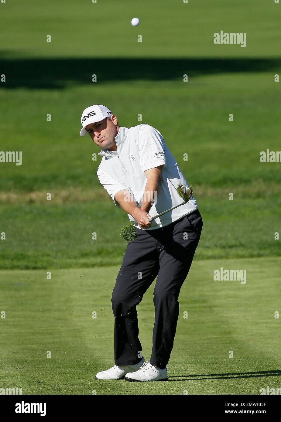 Rob Oppenheim hits to the second green of the Pebble Beach Golf Links ...