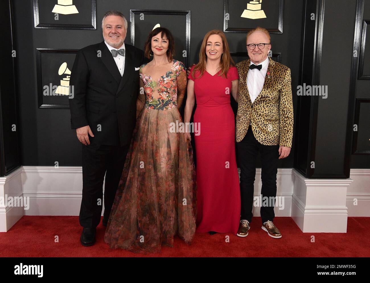 Jay Alix, from left, Carmen Cusack, Una Jackman, and Peter Asher arrive ...