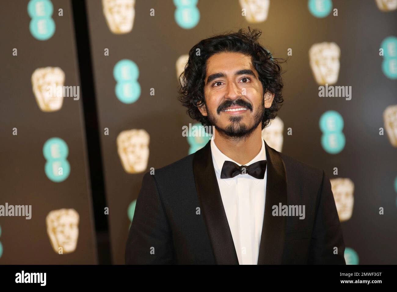 Actor Dev Patel poses for photographers upon arrival at the British ...