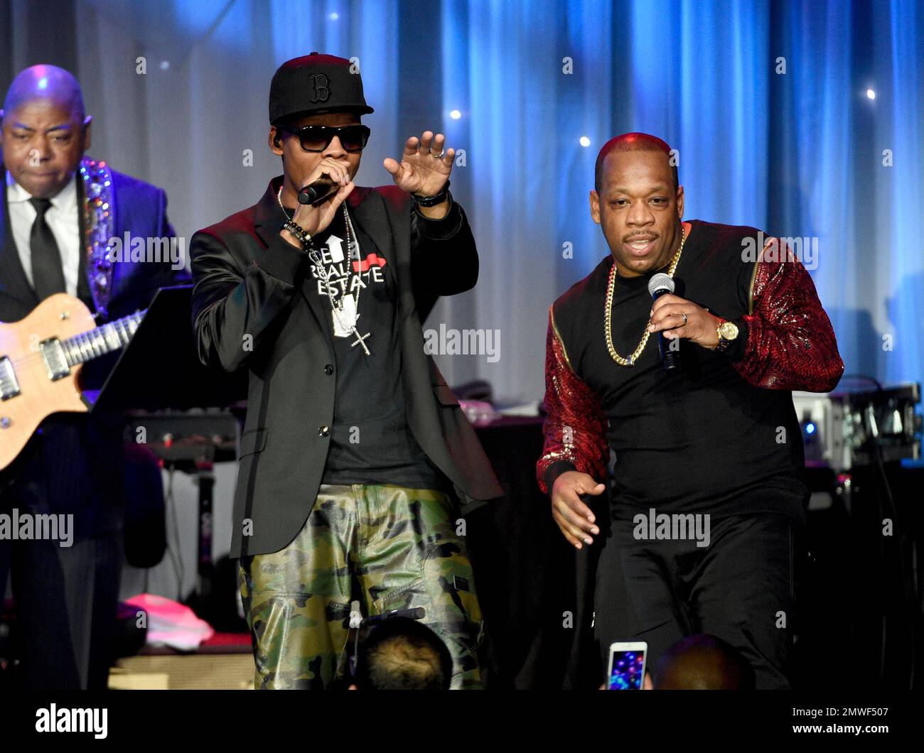 Ronnie DeVoe, left, and Michael Bivins perform at the Clive Davis and ...