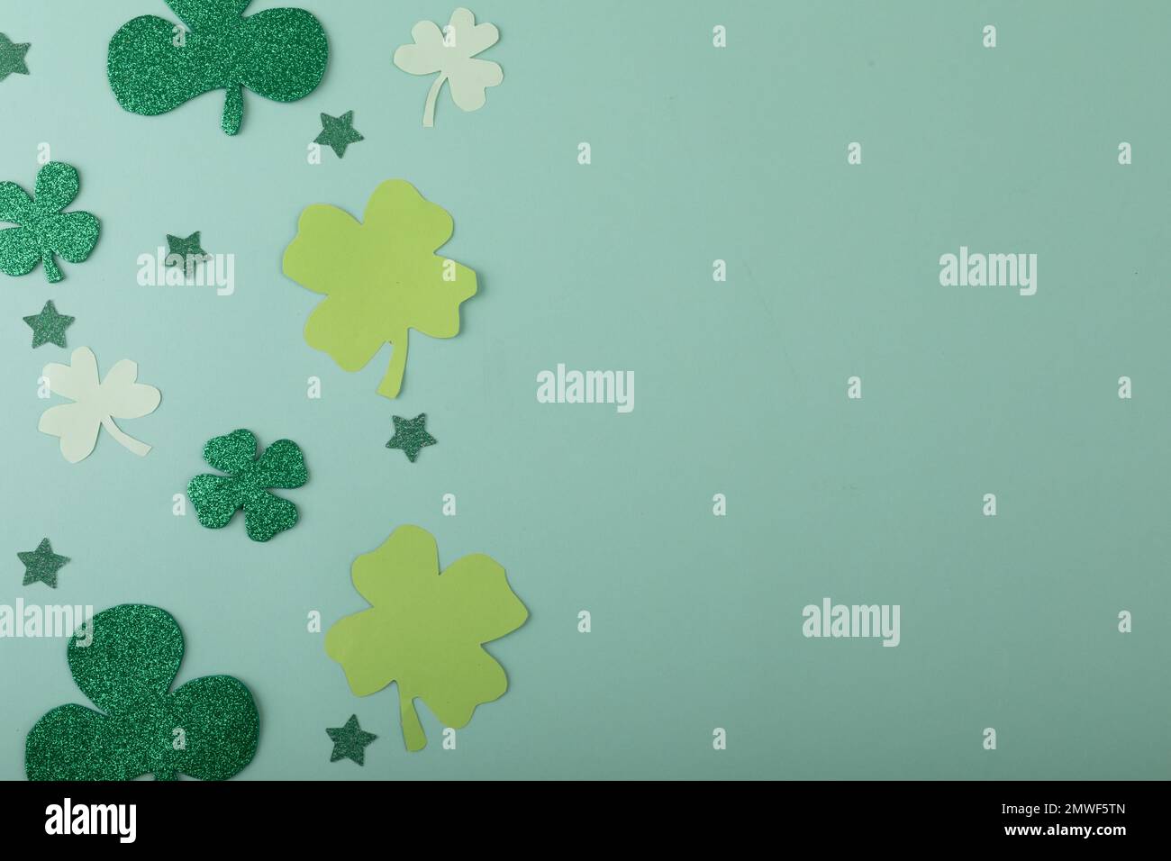 Top view photo of stars and shamrocks decorations with copy space on ...