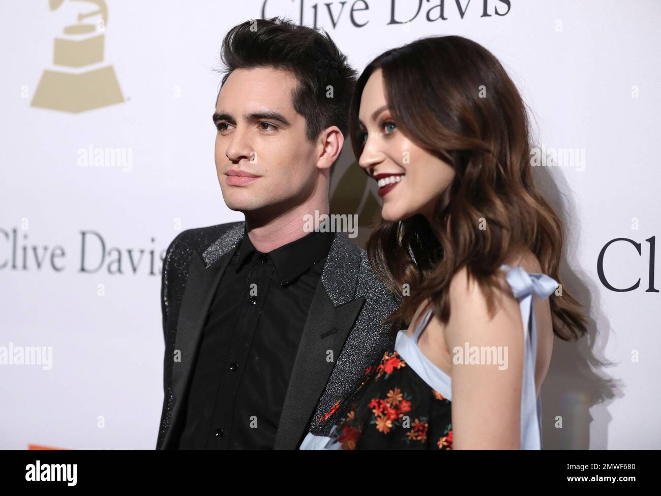 Brendon Urie, left, and Sarah Orzechowski attend the Clive Davis and ...