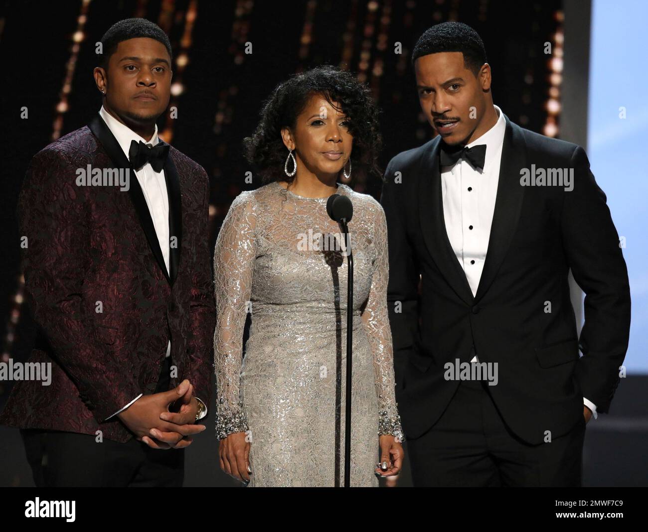 Pooch Hall, from left, Penny Johnson Jerald, and Brian White present ...