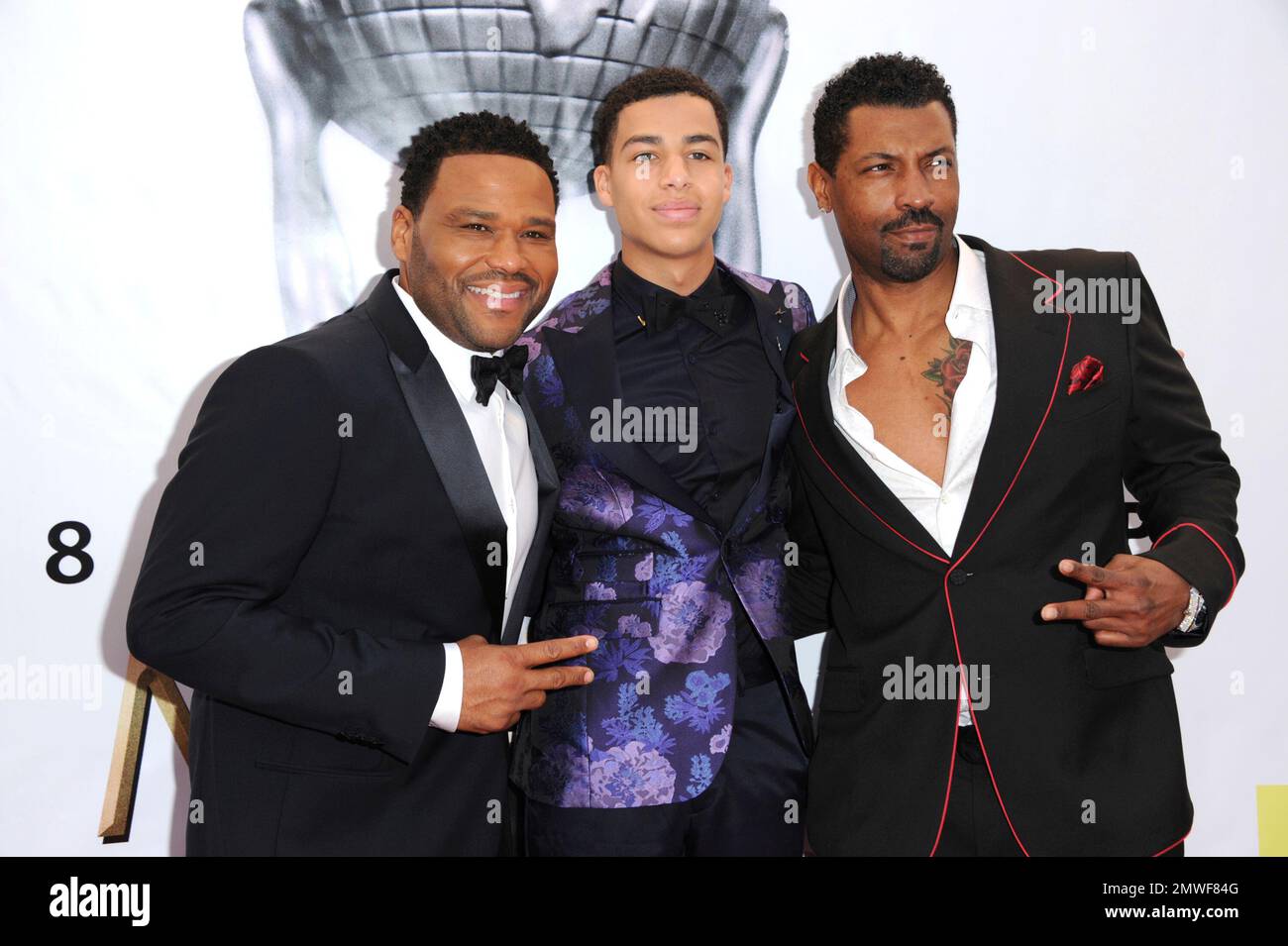 Anthony Anderson, from left, Marcus Scribner, and Deon Cole arrive at ...