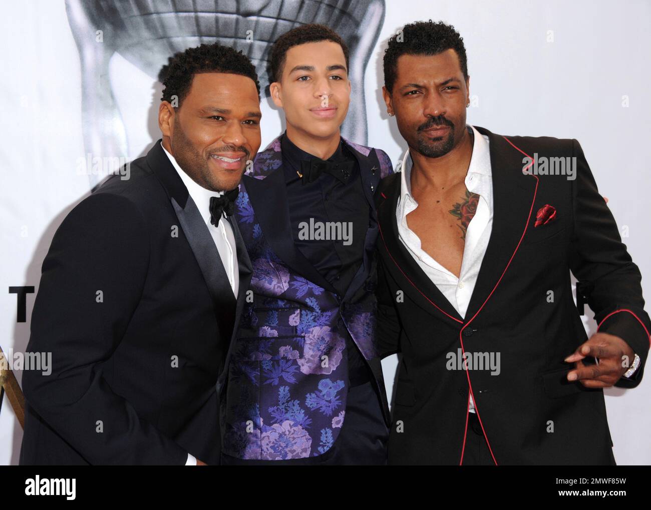Anthony Anderson, from left, Marcus Scribner, and Deon Cole arrive at ...