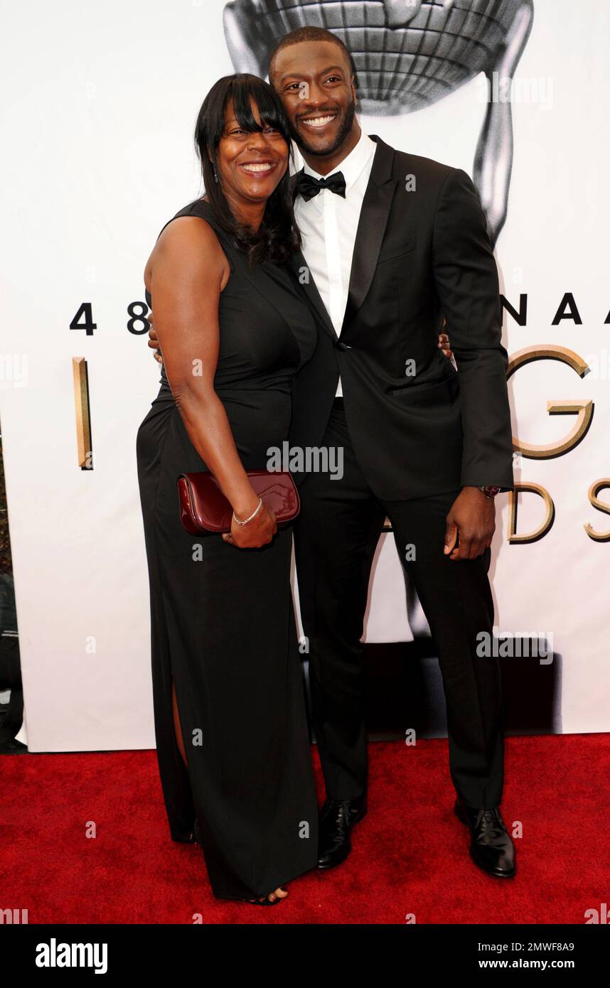 Yolette Evangeline Richardson, left, and Aldis Hodge arrive at the 48th ...