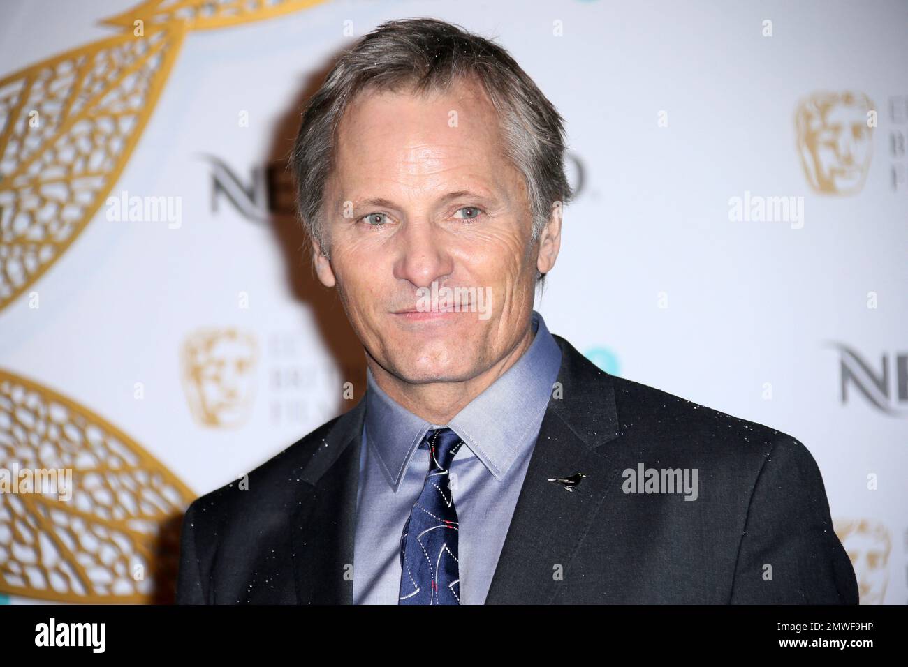 Actor Viggo Mortensen poses for photographers upon arrival at the ...