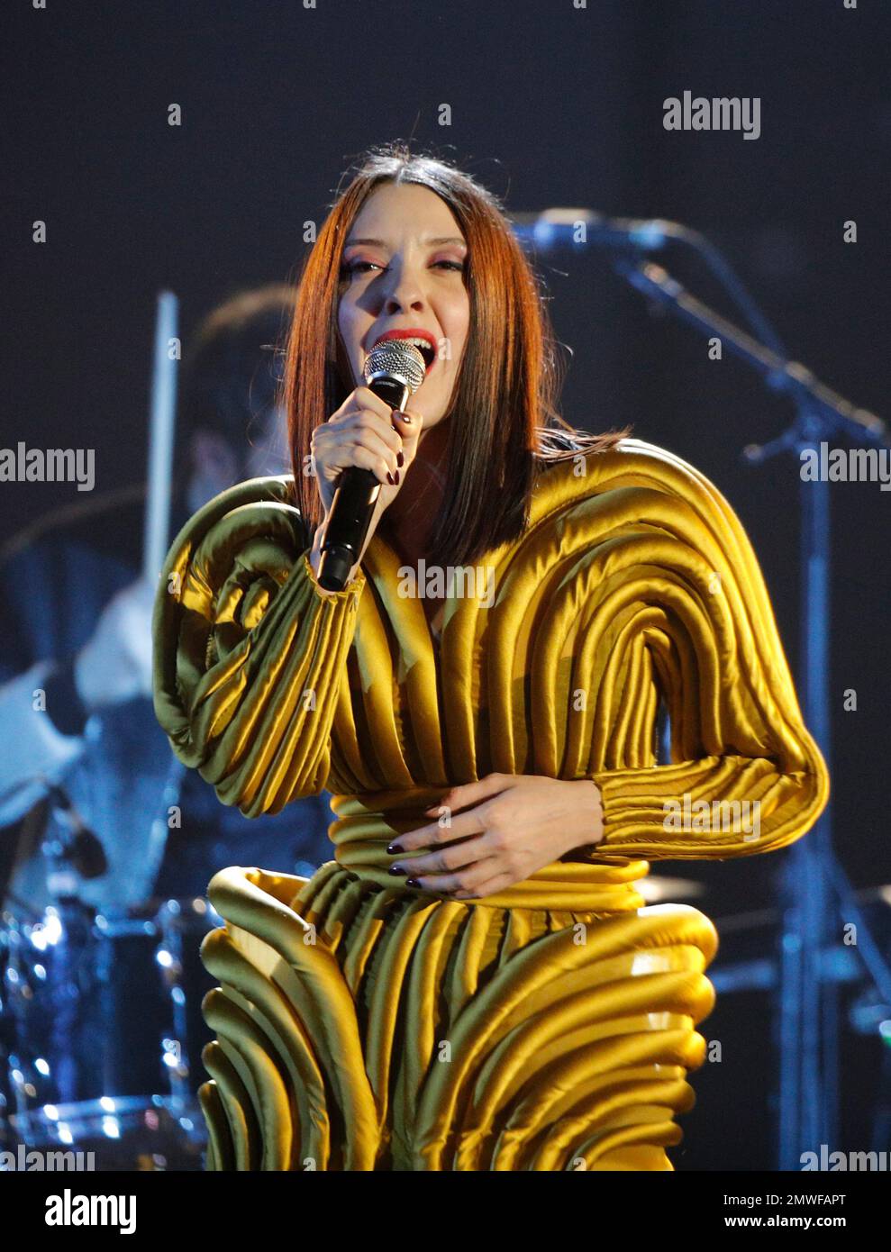 French singer of Minuit rock band Simone Ringer performs on stage with ...
