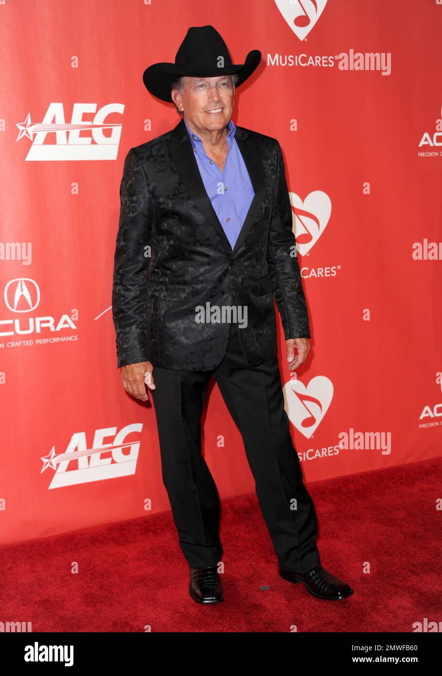 George Strait arrives at the MusiCares Person of the Year tribute ...