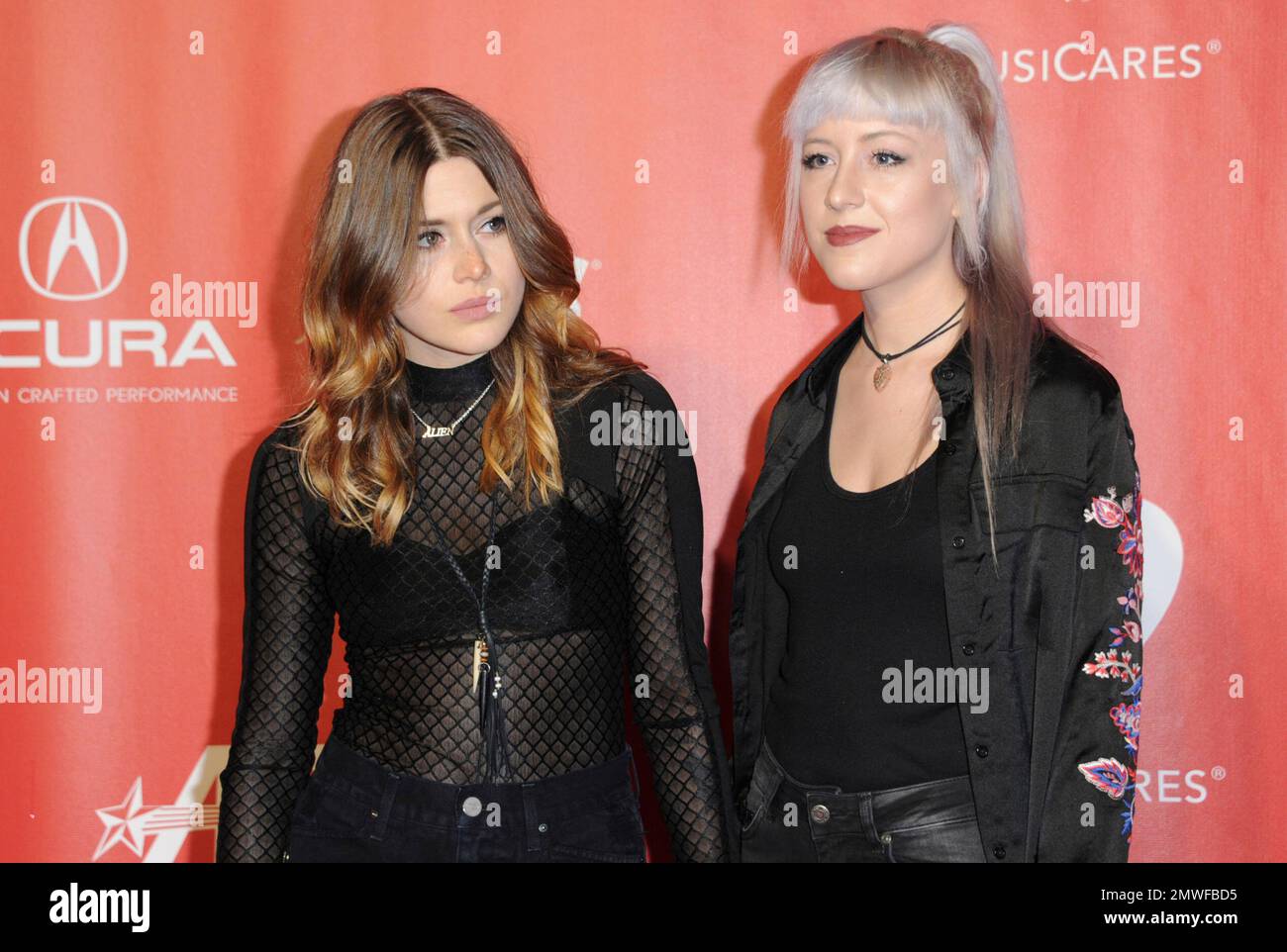 Rebecca Lovell, left, and Megan Lovell, of Larkin Poe, arrive at the ...
