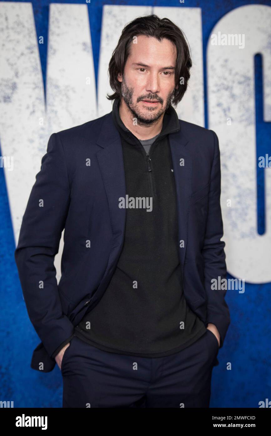 Actor Keanu Reeves poses for photographers upon arrival for the ...