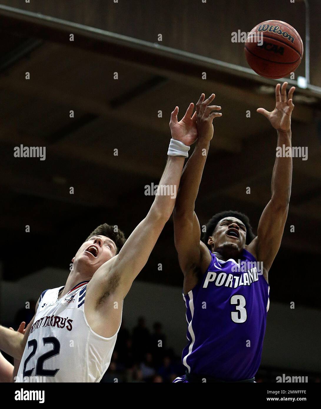 Portland's Rashad Jackson, right, and Saint Mary's Dane Pineau (22 ...