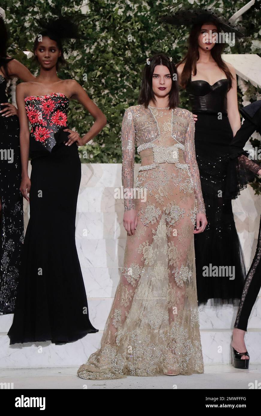 Kendall Jenner, center, and other models model the La Perla fashion ...