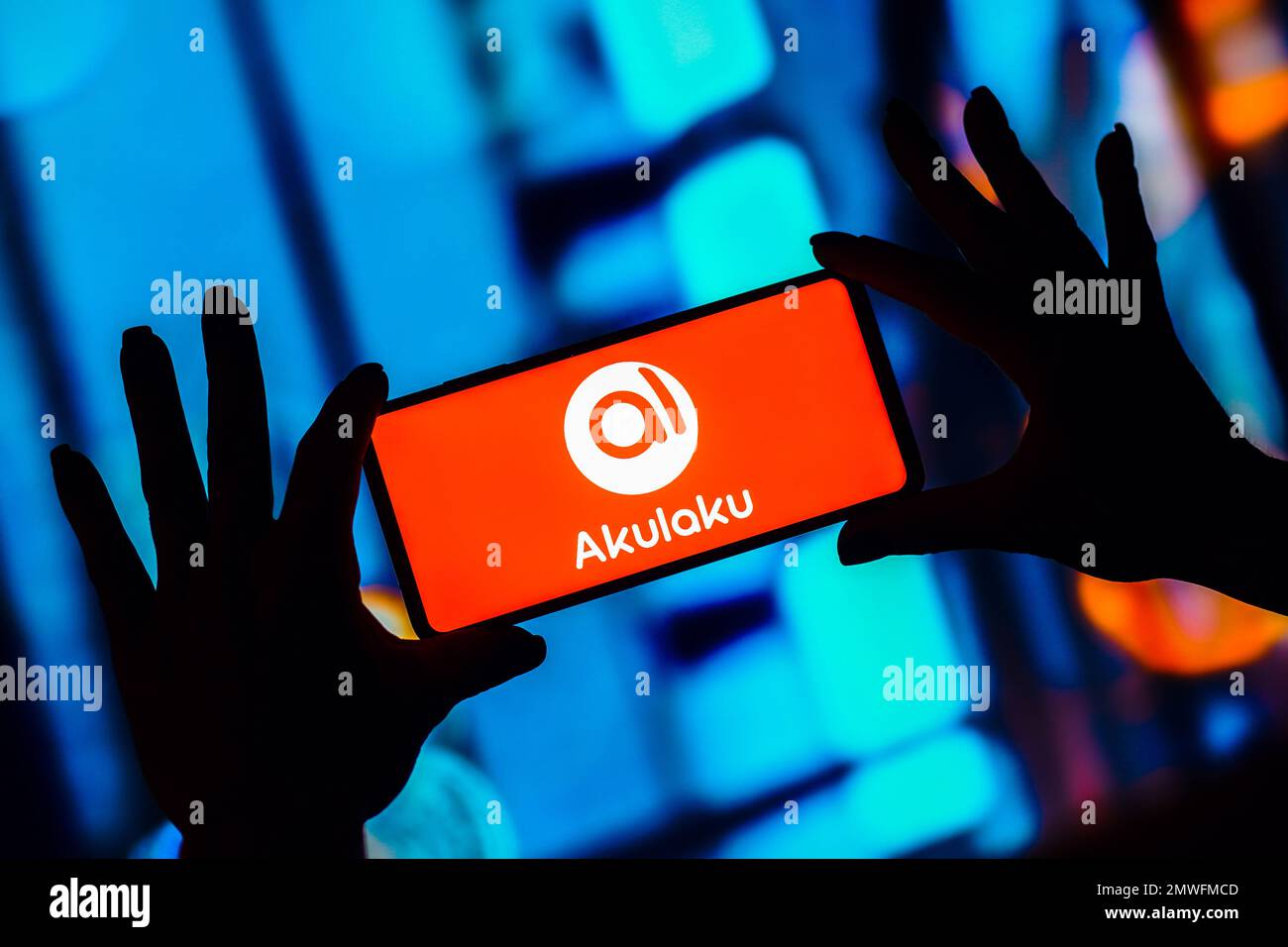 In this photo illustration, the Akulaku logo is displayed on a ...