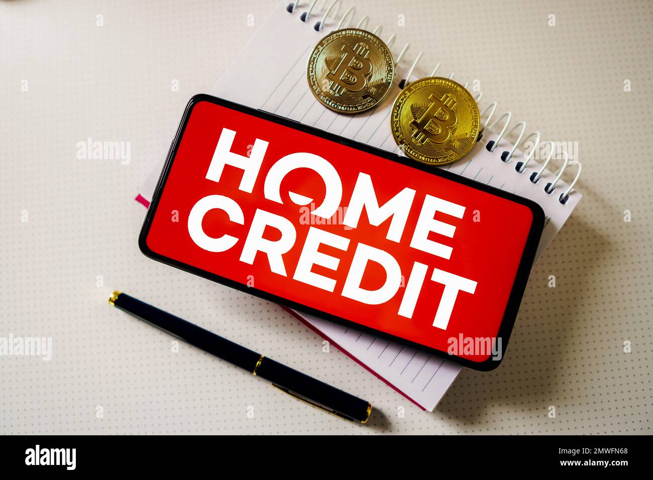 In this photo illustration, the Home Credit logo is displayed on a ...
