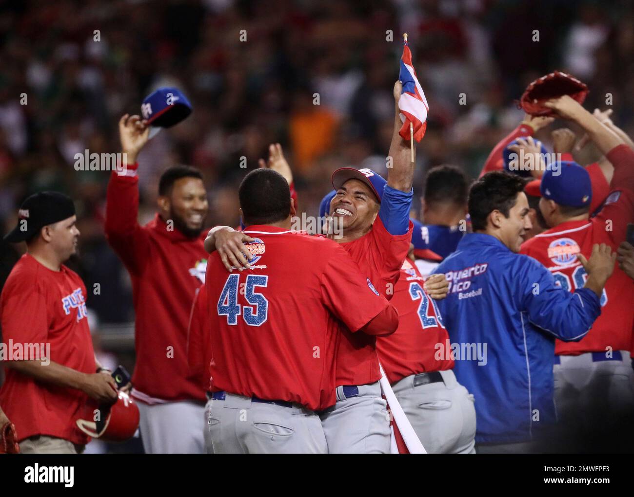 Puerto Rico's Criollos de Caguas players celebrate after the team won ...