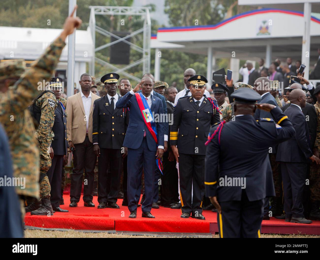 Haiti's President Jovenel Moise stands next to Police Chief Michel-Ange ...