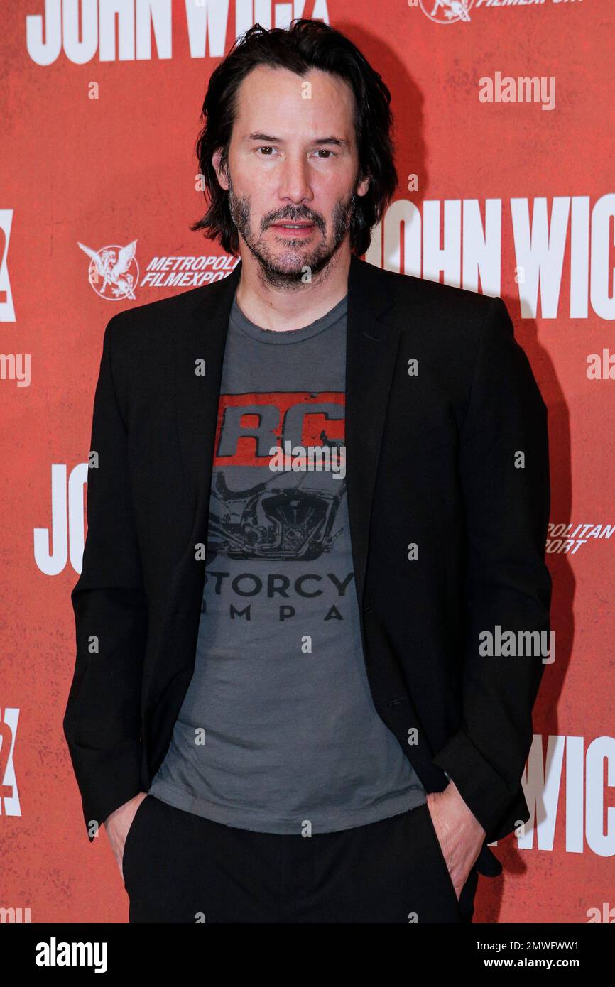 Actor Keanu Reeves poses for the media as he arrives for the French ...