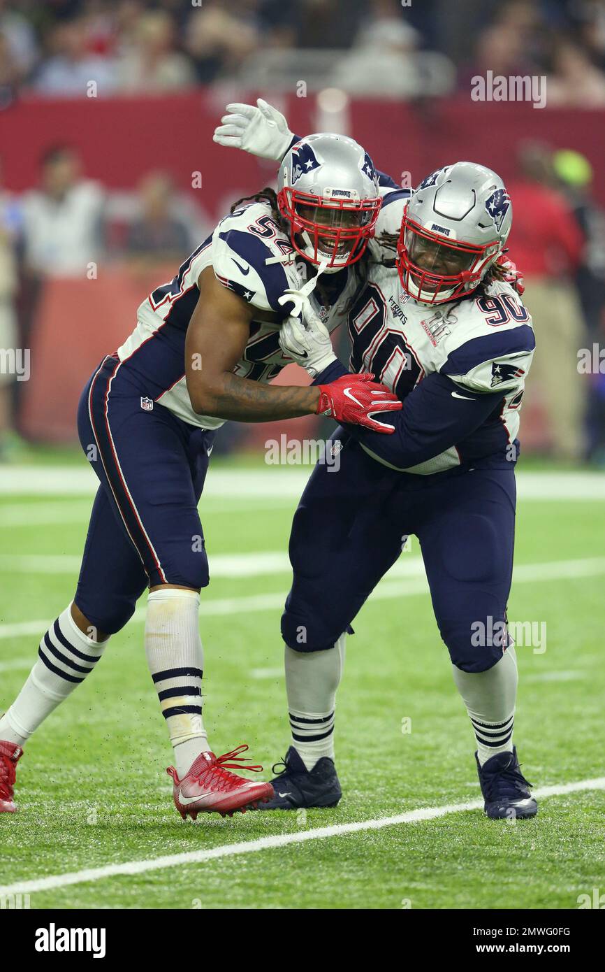 New England Patriots Dont'a Hightower #54 is congratulated by teammate ...