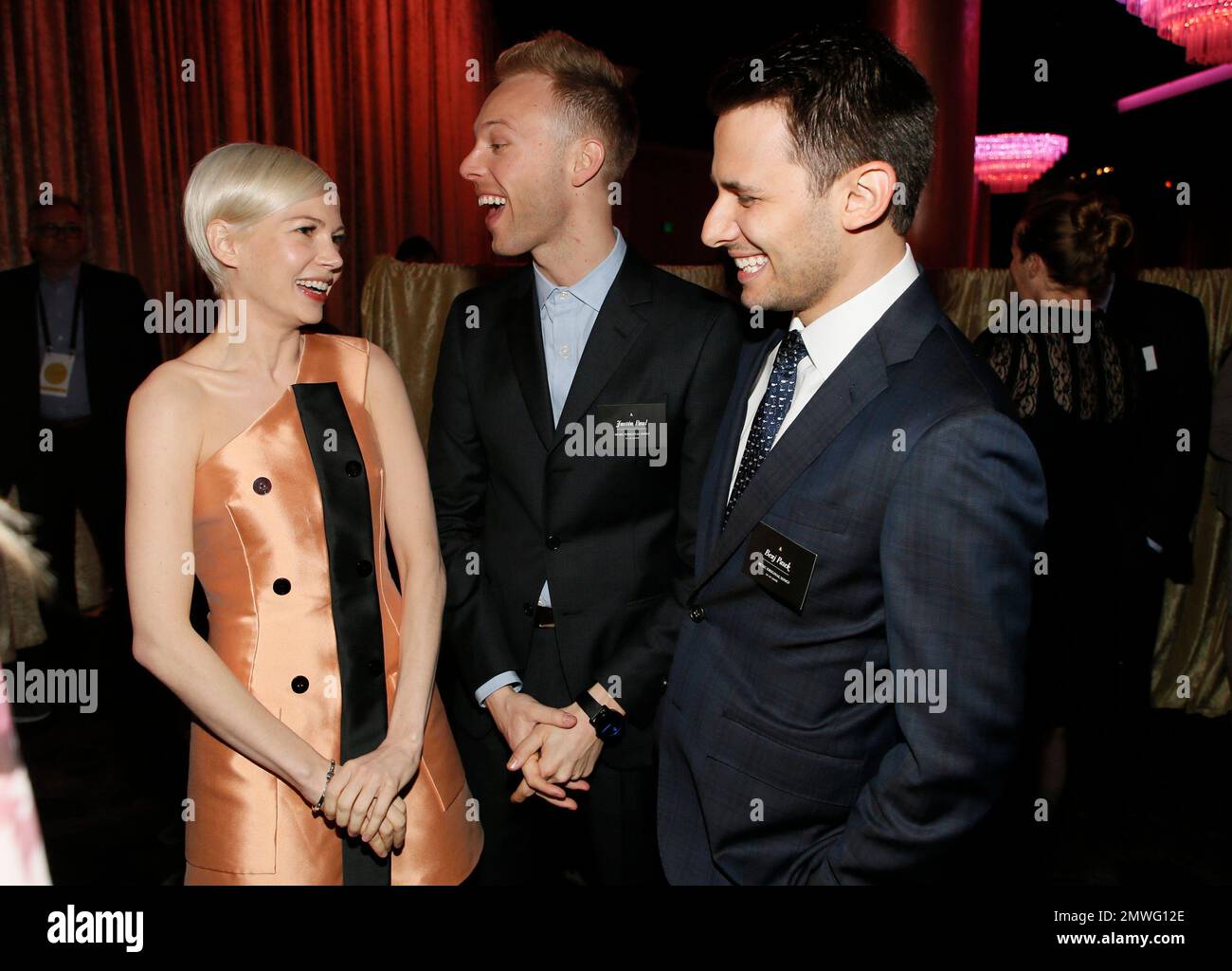 Michelle Williams, from left, Justin Paul and Benj Pasek attend the ...