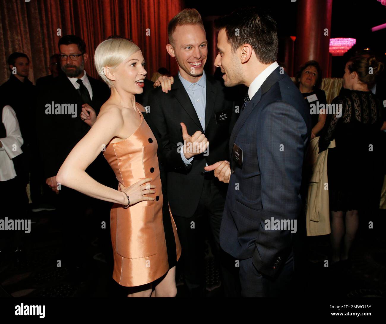 Michelle Williams, from left, Justin Paul and Benj Pasek attend the ...